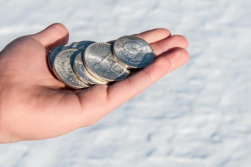 Cold Hard Cash - Silver Coins in a Young Man S Hand Stock Photo - Image ...