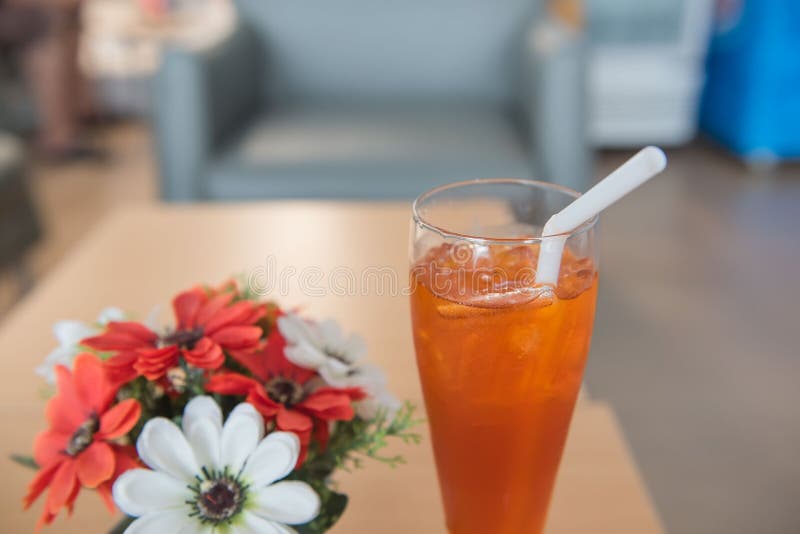 Cold Ice Tea in Glass and Flower in Restaurant Stock Image - Image of ...
