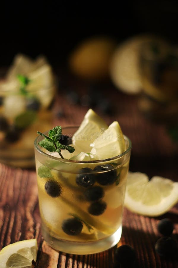 Cold Ice Tea with Lemon and Berries Stock Photo - Image of lemonade ...