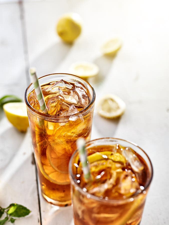 Cold Ice Tea with Sliced Lemons and Straws Stock Photo - Image of ...