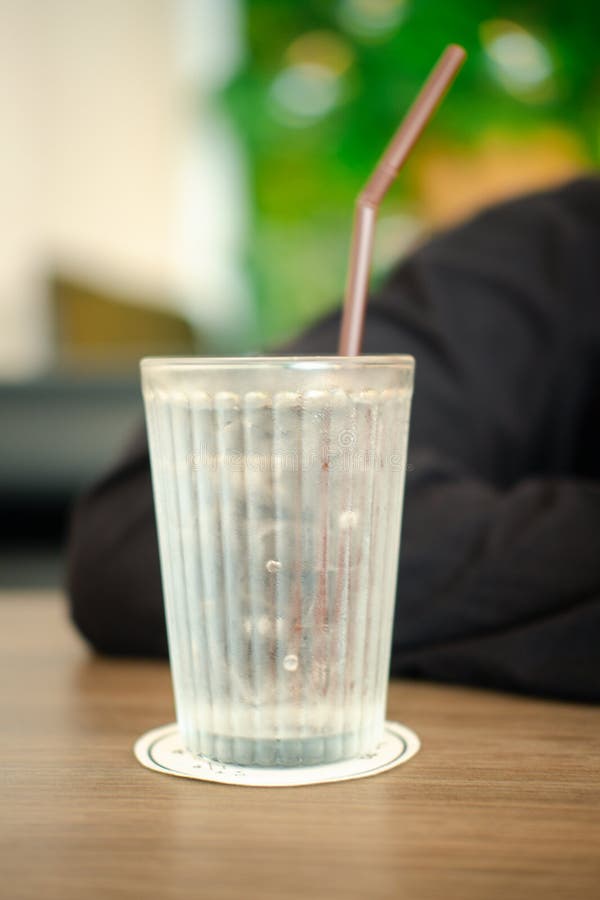 Cold ice water with straw stock photo. Image of simplicity - 375223352