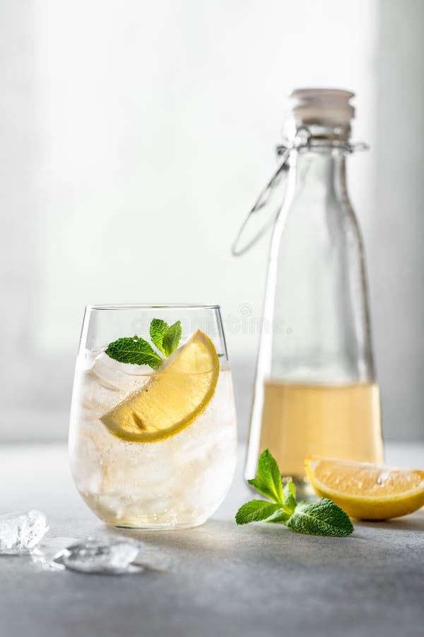 Cold lemonade with ice stock photo. Image of yellow - 183556068