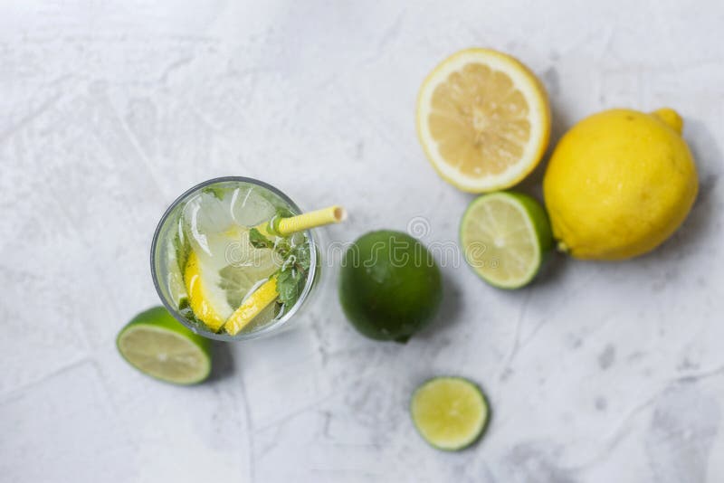 Cold Lemonade with Ice. Tasty Lemonade with Lemon, Lime and Mint.Cold ...