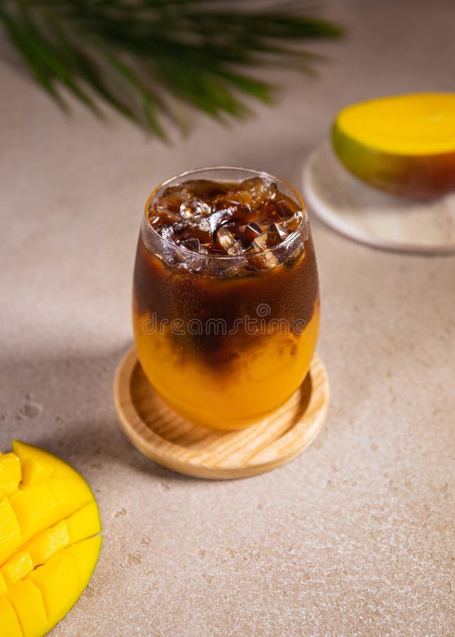 Cold Mango and Coffee Cocktail with Ice Stock Image - Image of concept ...