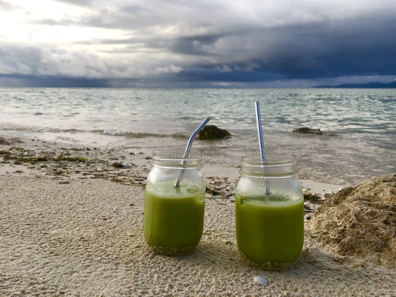 Cold Matcha Latte in the Beach Stock Image - Image of latte, horizon ...