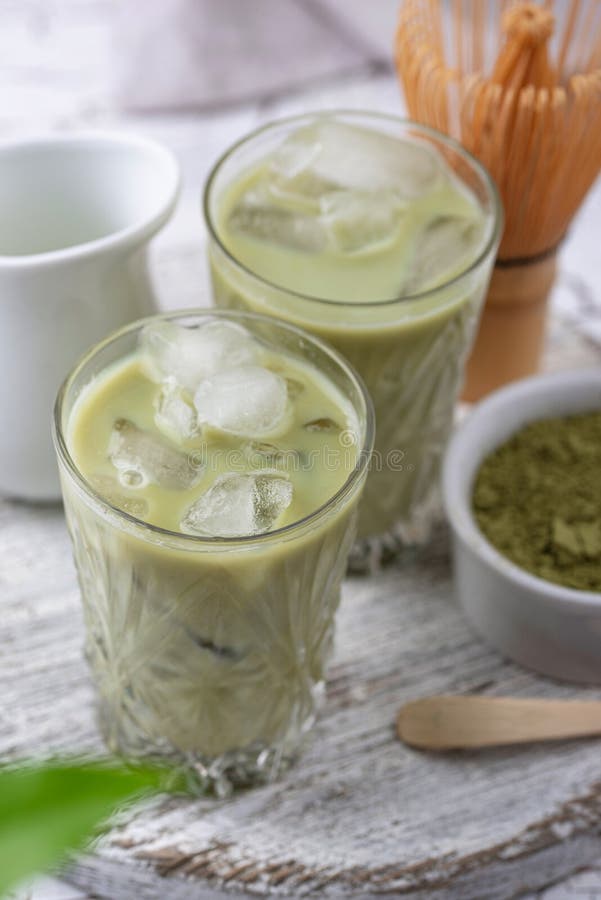 Cold Matcha Tea with Milk and Ice Stock Photo - Image of vegan, whisk ...