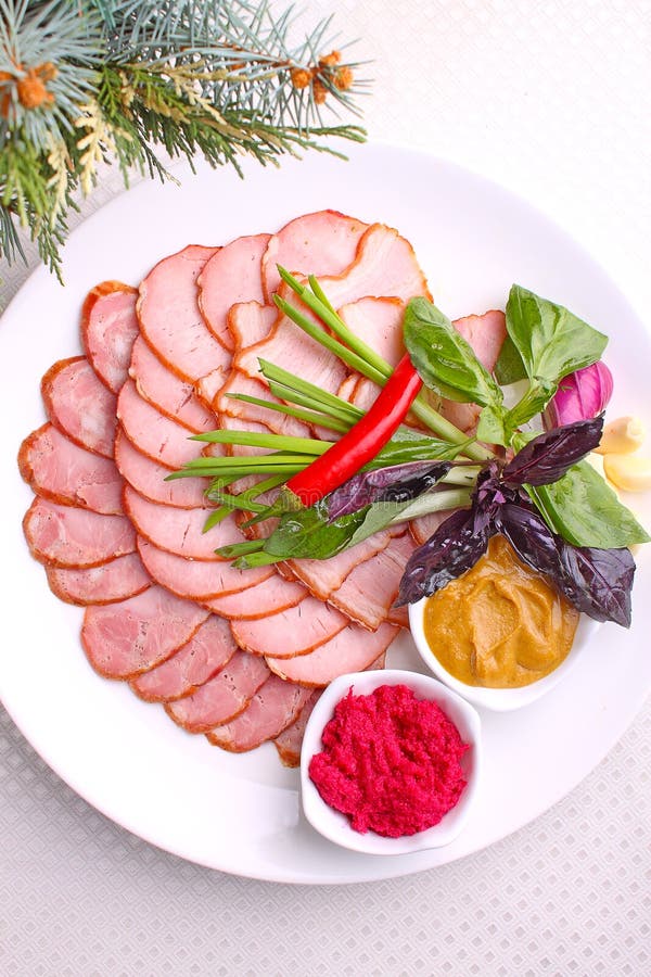 Cold Meat Cuts on a Festive Table Stock Photo - Image of plate, sauce ...