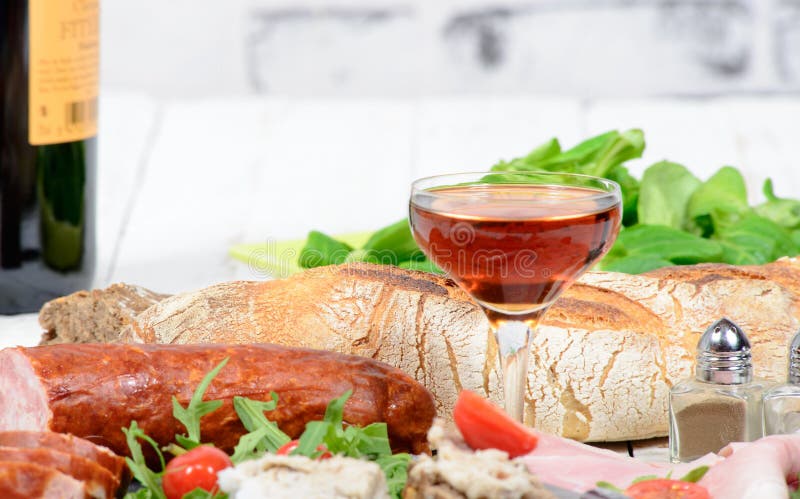 Cold meats plate with wine stock photo. Image of bread - 55316316
