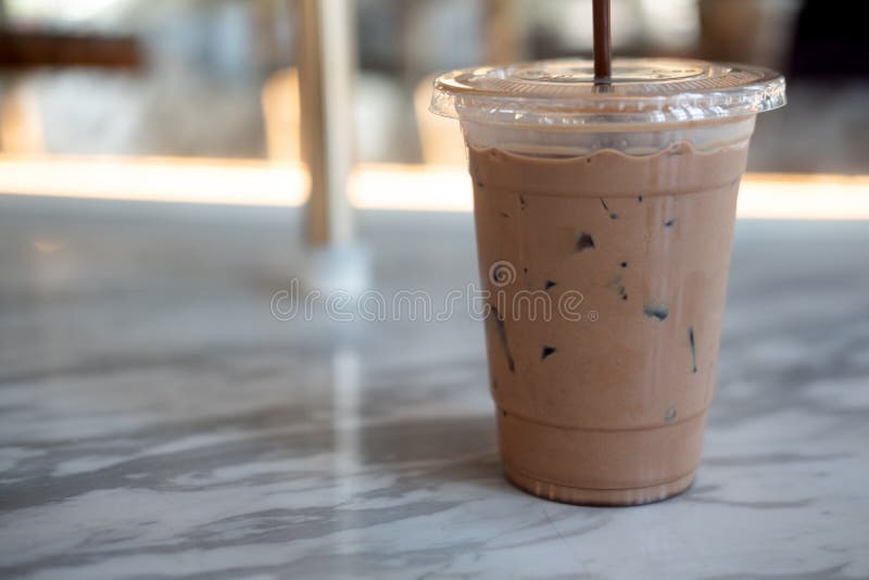 Cold Mocha Coffee in Plastic Cup at Cafe Stock Photo - Image of milky ...