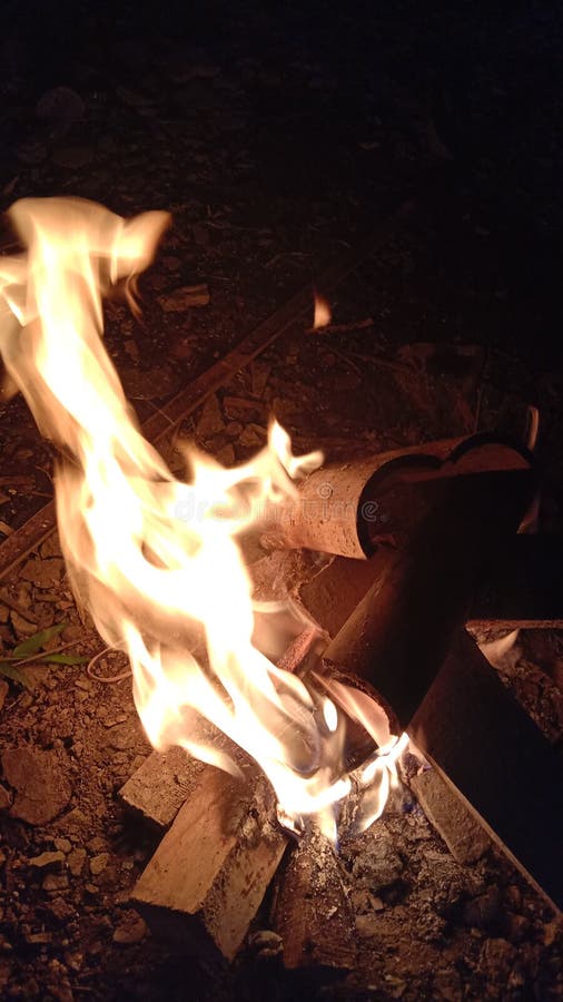 The Cold of the Night Healed by the Burning Fire Stock Photo - Image of ...