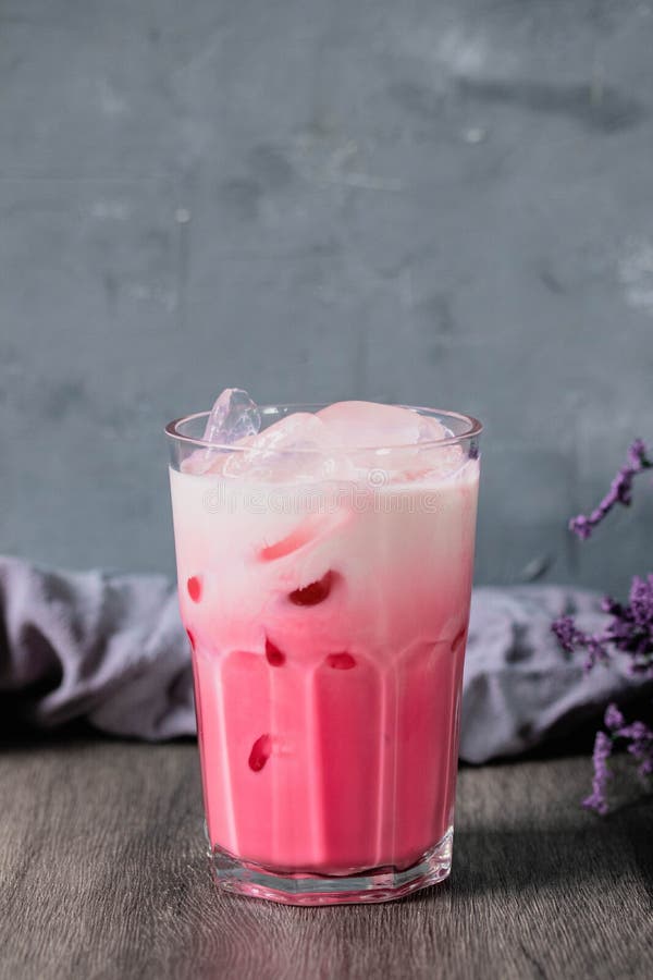 Cold Pink Milk Cold Drink in Clear Glass on Gray Background. Thai Milk ...