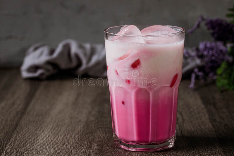 Cold Pink Milk Cold Drink in Clear Glass on Gray Background. Thai Milk ...