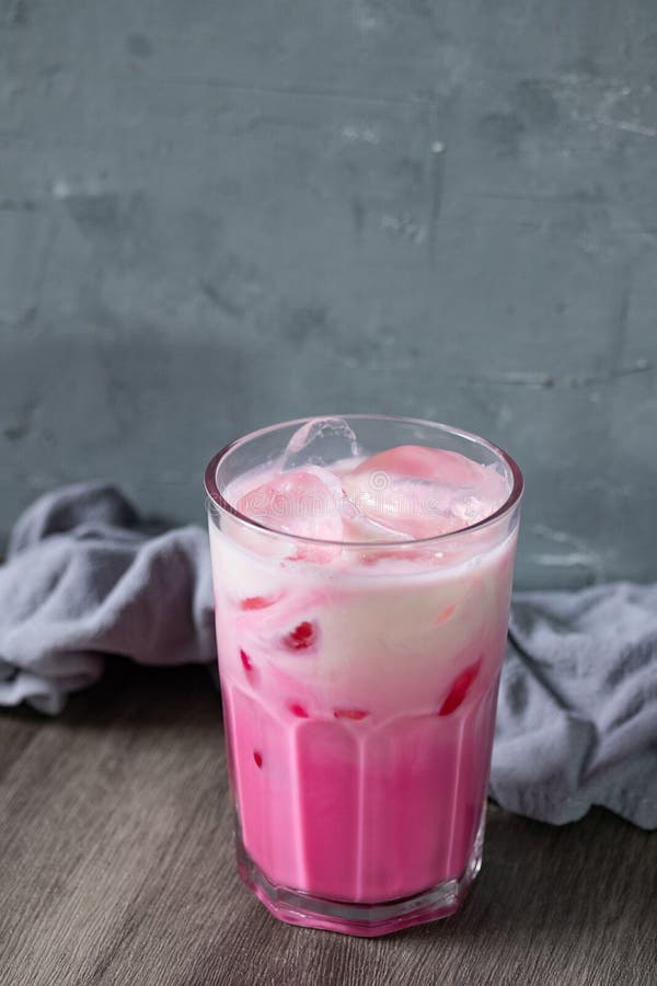 Cold Pink Milk Cold Drink in Clear Glass on Gray Background. Thai Milk ...