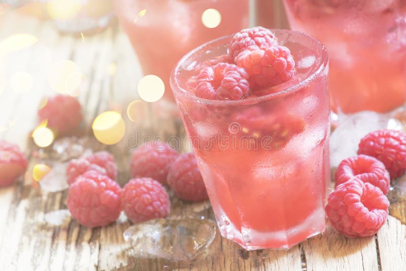 Cold Raspberry Cocktail with Ice, Pink Summer Berry Beverage, Selective ...