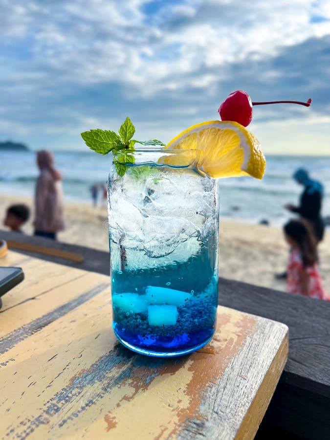 A Cold and Refreshing Blue Ocean Cocktail is Placed on the Table at a ...