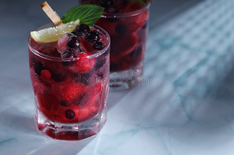 Cold Refreshing Drink with Fresh Berry and Ice Stock Photo - Image of ...