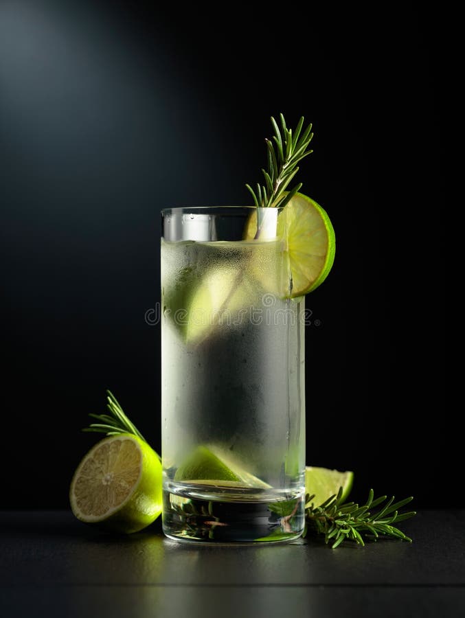 Cold Refreshing Drink with Ice, Lime, and Rosemary Stock Image - Image ...