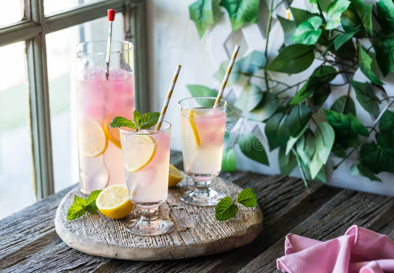 Cold and Refreshing Lemonade with Pink Lemonade Ice Cubes, Ready for ...