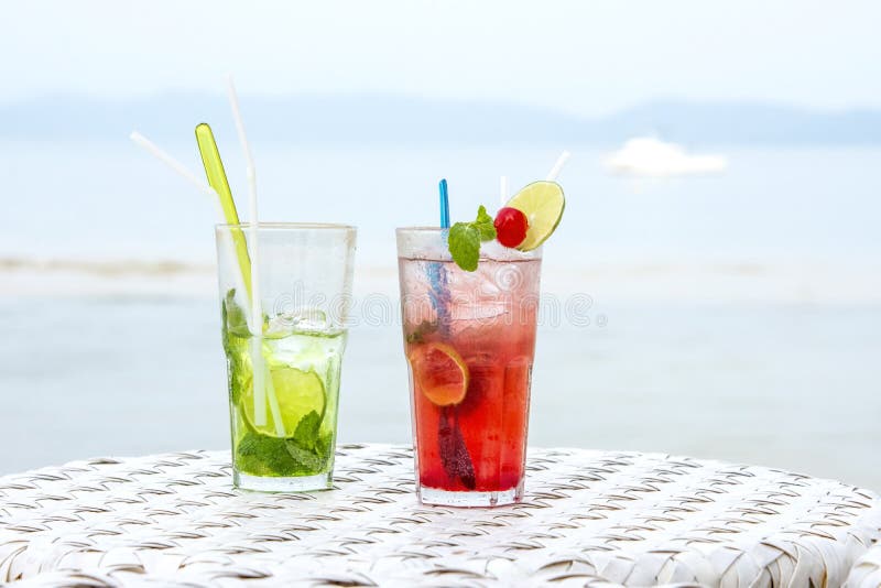 Glasses of Cold Drinks on Beachside Table. Stock Image - Image of beach ...