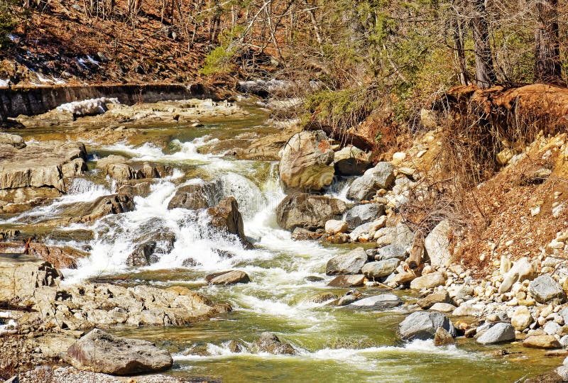 Cold River Waterfall Over Rocks in Early Spring Stock Image - Image of ...