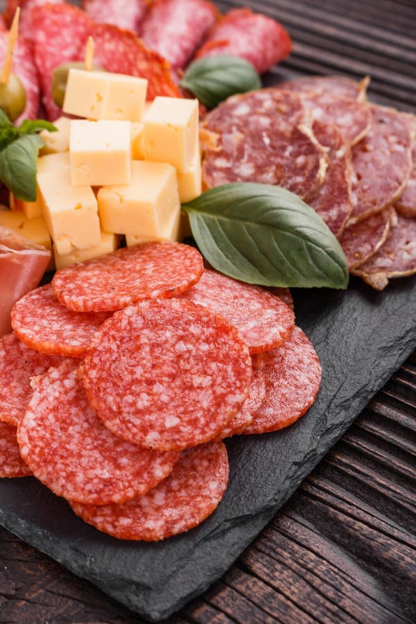Cold Smoked Meat Plate on a Rustic Wooden Background Stock Image ...