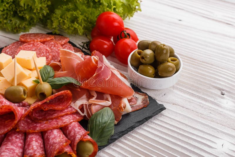 Cold Smoked Meat Plate on a Rustic Wooden Background Stock Photo ...