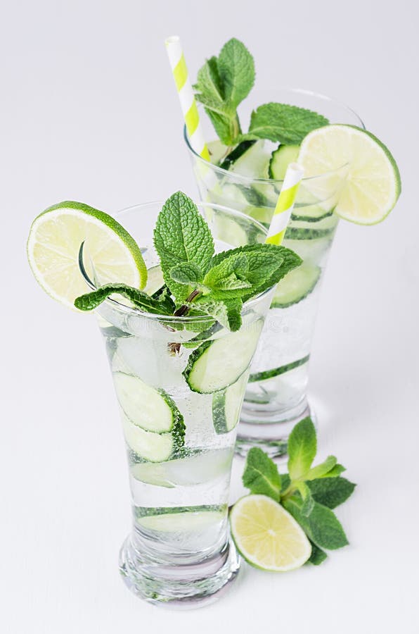 Cold Spring Drink With Cucumber, Lime, Mint And Ice On Soft White ...