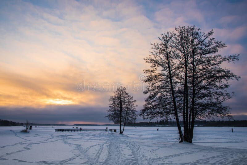 Cold sunset stock image. Image of clouds, lake, sunset - 65184477