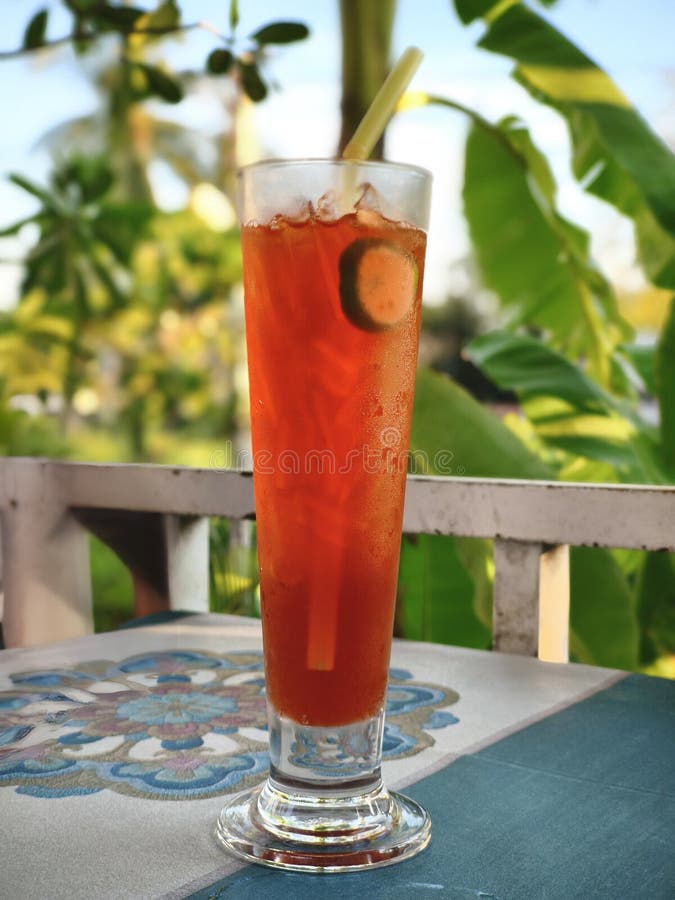 Cold Tea Beverage with Lemon in Long Glass at the Table Stock Image ...