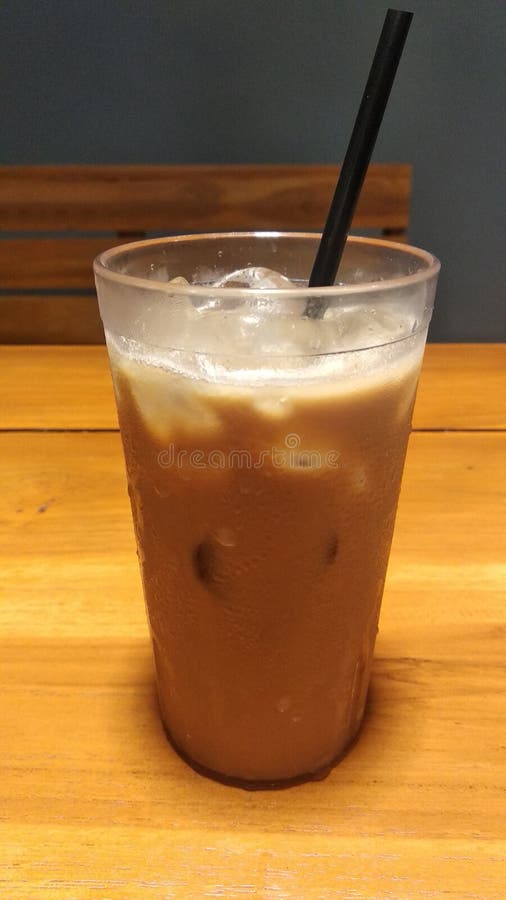 Cold Vanilla Latte Drink Served on a Brown Table Stock Image - Image of ...