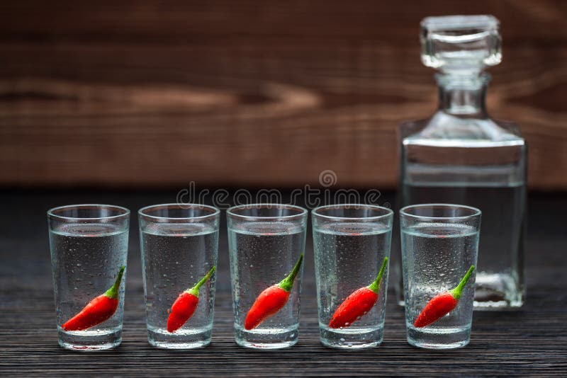 Cold Vodka with Hot Chili Peppers , Selectiv Focus Stock Photo - Image ...