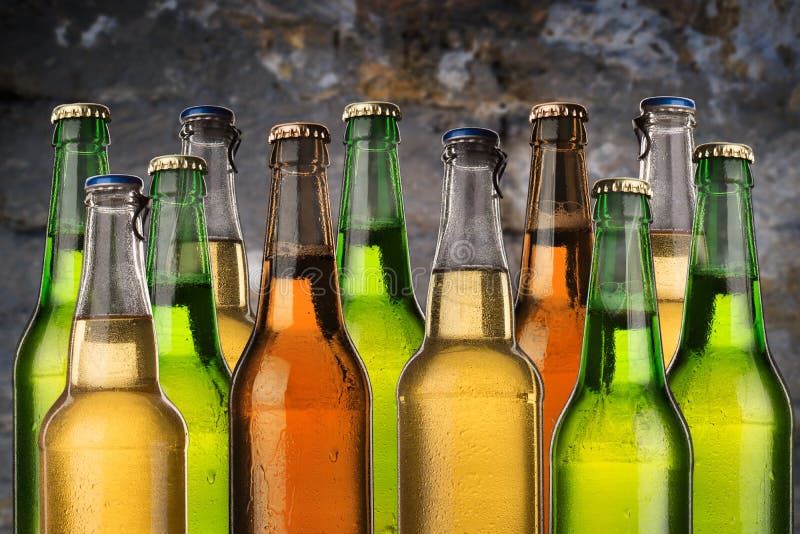 Cold wet beer bottles stock image. Image of background - 146913225