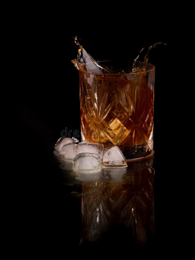 Cold whiskey with ice stock photo. Image of crystal - 207220010