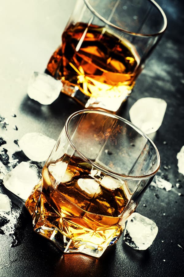 Cold Whiskey with Ice Cubes in Black Table, Selective Focus Stock Image ...
