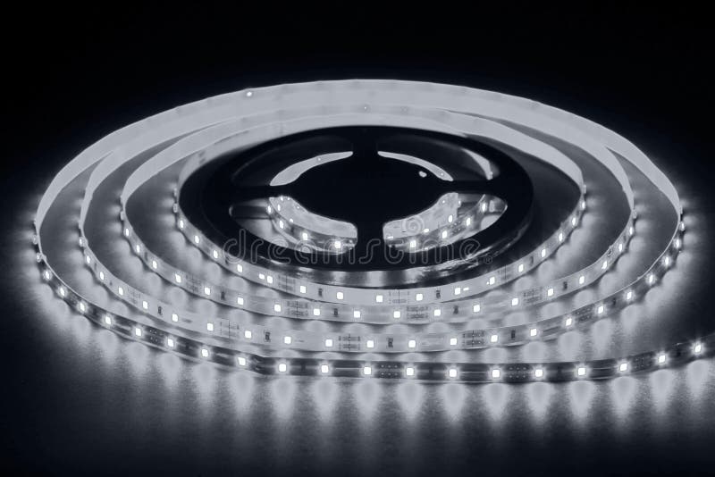 Cold White LED Strip on Reel with Black Background Stock Image - Image ...