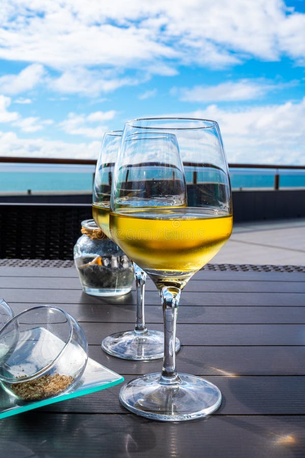 Cold White Wine Served in Restaurant with Ocean View Stock Photo ...