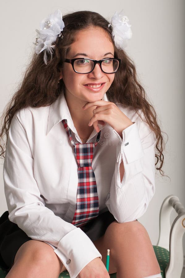 Colegiala sonriente imagen de archivo. Imagen de sonriente - 63018229
