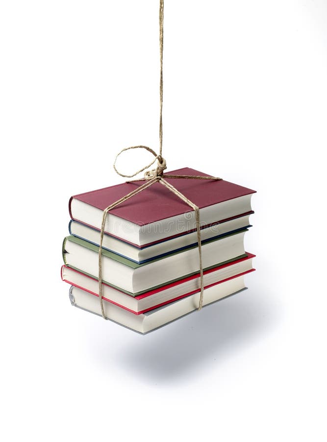 Libros colgados del hilo imagen de archivo. Imagen de arte - 228540541