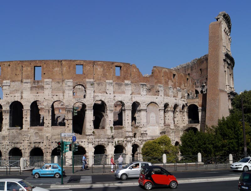 Coliseum and city traffic editorial image. Image of street - 21852325