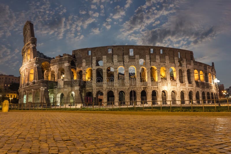 The Coliseum in the Clouds in Twilight Stock Photo - Image of ...