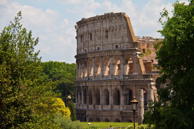 Coliseum through the trees stock image. Image of brick - 27086989
