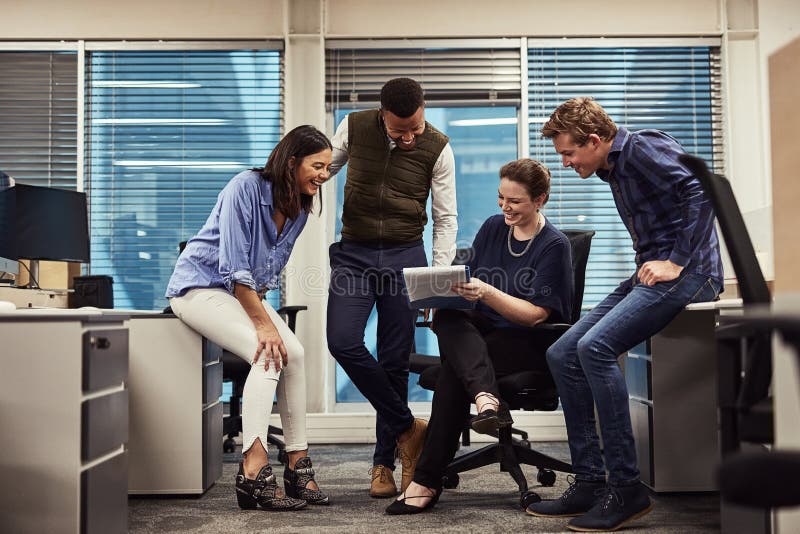 Collaborating on a Big Design. a Group of Designers Brainstorming ...