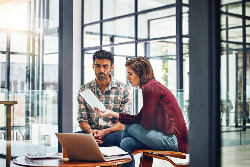Collaborating on a Design. Two Young Designers Working Together in ...