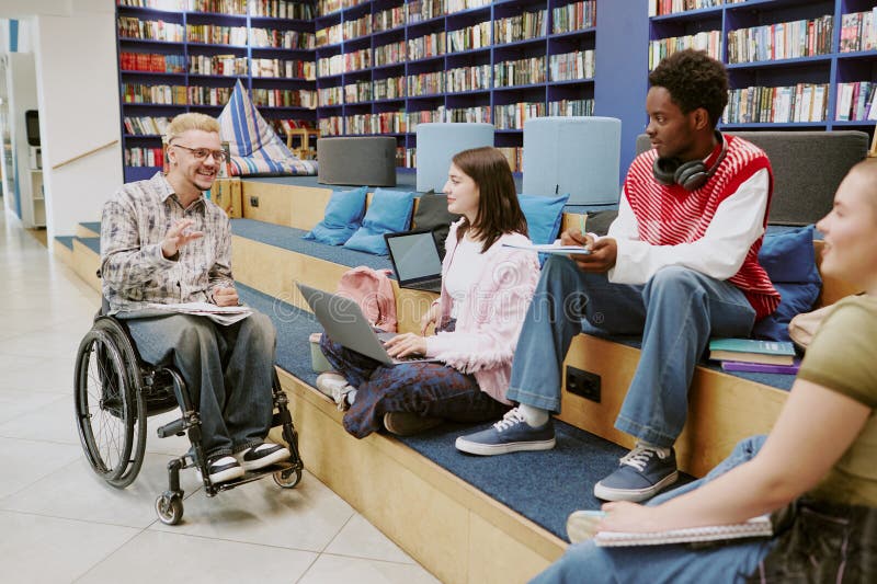 Collaborating in Library for Group Study Session Stock Photo - Image of ...