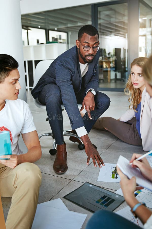 Collaborating on a New Campaign. a Group of Colleagues Having a ...