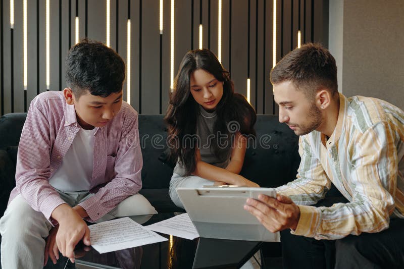 Collaborating in Office on Business Project Together Stock Photo ...