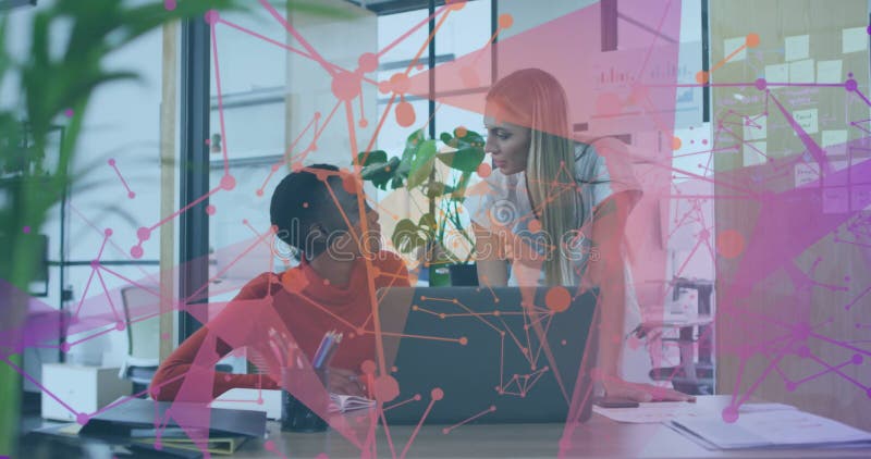 Collaborating Office Colleagues Discussing Project at Office Desk, with ...