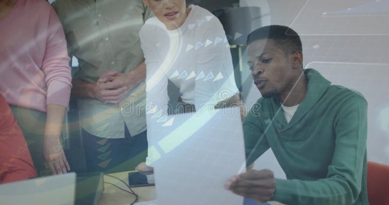 Collaborating Over Documents, Diverse Team in Office with Digital Data ...