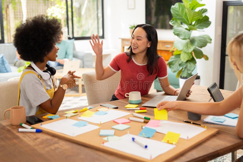 Collaborating on Project, Friends Brainstorming with Sticky Notes and ...