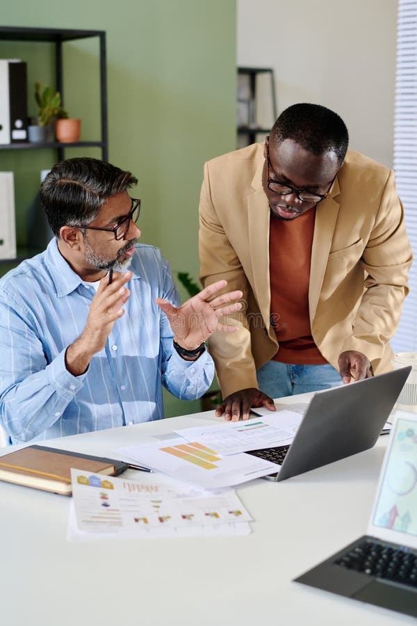 Collaborating on Project in Modern Office Setting Stock Image - Image ...